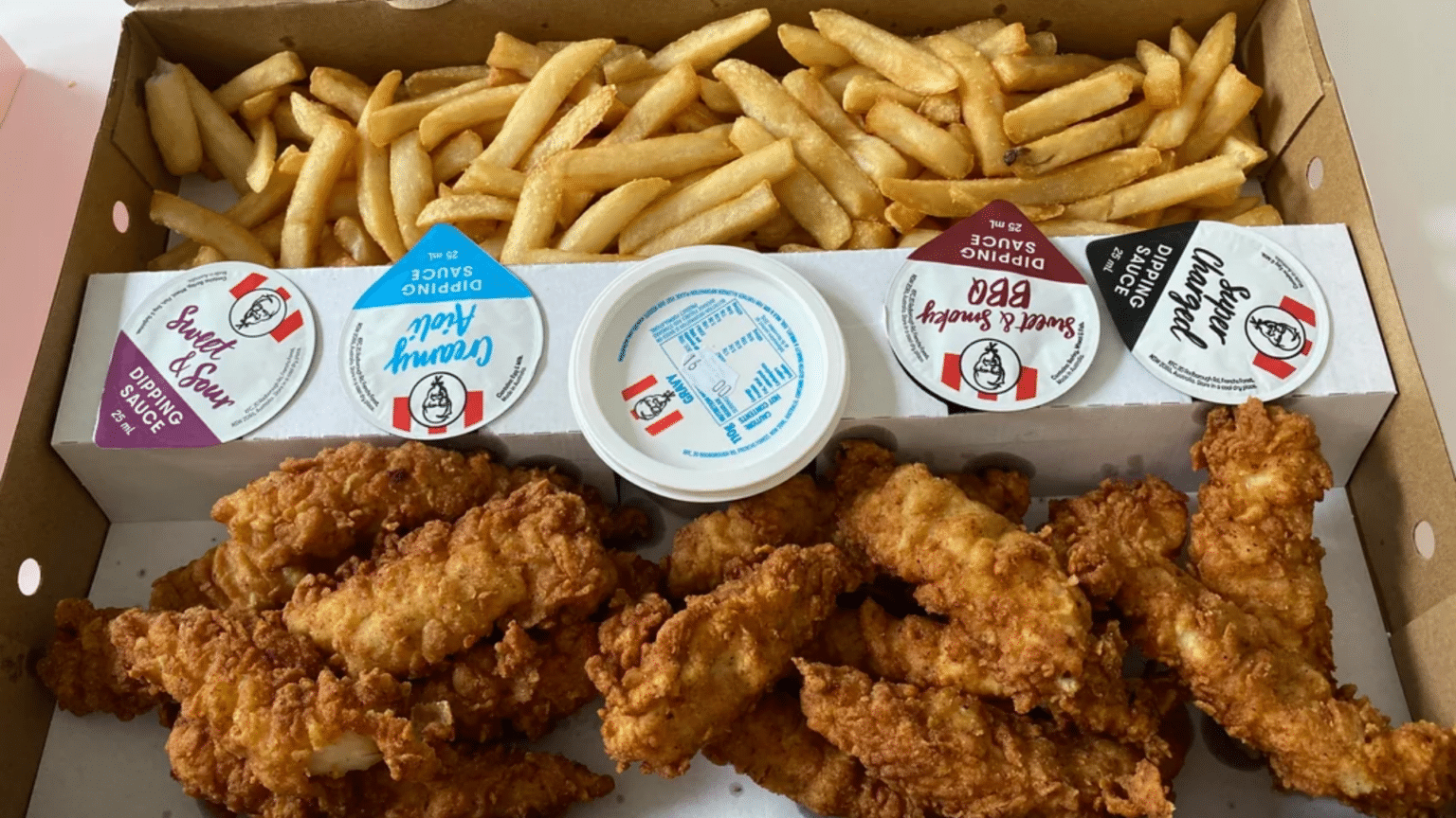 KFC Launches a New $10 Bucket Deal With a Different Menu Item Every ...